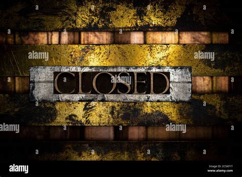 closed text formed with real authentic typeset letters on vintage