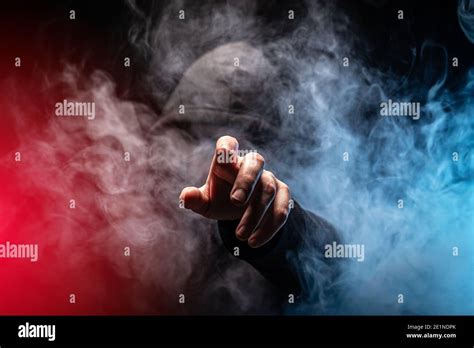 Hacker In A Smoke Filled Background A Hacker In A Hood Dark Face