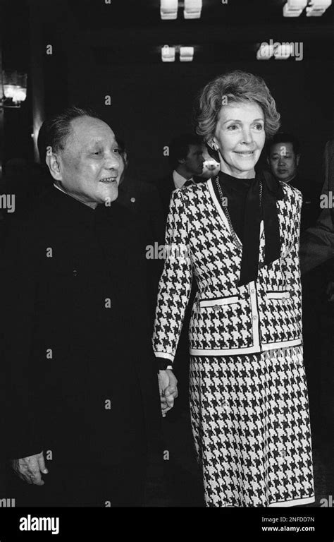 Chinese Leader Deng Xiaoping Left And First Lady Nancy Reagan Hold Hands While Posing For