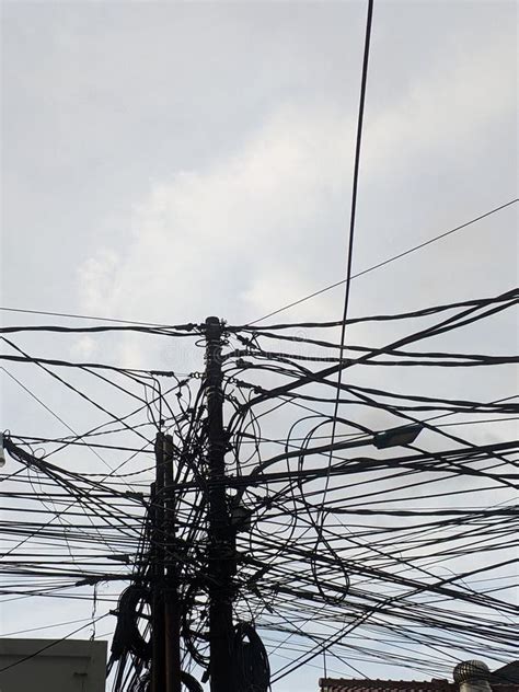 Tangle Of Power Electricity Wire And Internet Wire In Indonesia Stock
