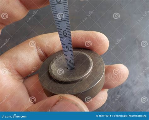 Measuring The Hole Size Of A Spay Nozzle Stock Photo Image Of Hole Instrument