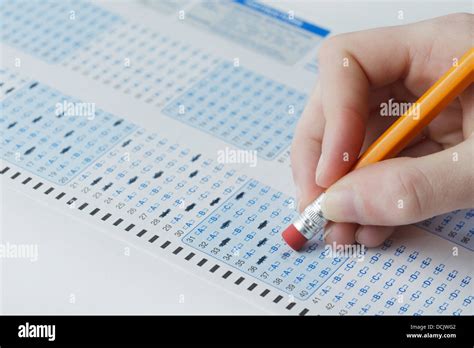 Optical Scan Answer Sheet For A School Exam With Student Erasing Answer