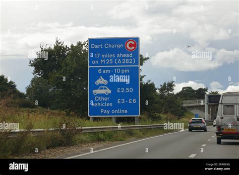 an advanced warning board indicating the charges levied for the dart crossing on the m25 some 17