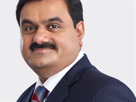 Adani Group Company Ambuja Cements Acquires Sanghi Industries For Rs