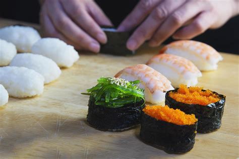 Japanese Maki Sushi Roll Serving In Oriental Restaurant Chef Is