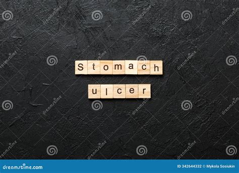 Stomach Ulcer Text With Stethoscope And Capsule Medicine On Blue Background Stock Image
