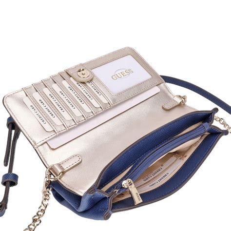 Guess Umhängetasche Noelle Xbody Flap Organizer 79750 Navy Koffer Kopf
