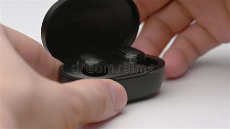 Modern Black Wireless Earbuds With Bluetooth For Smartphone Isolated On White Background Stock