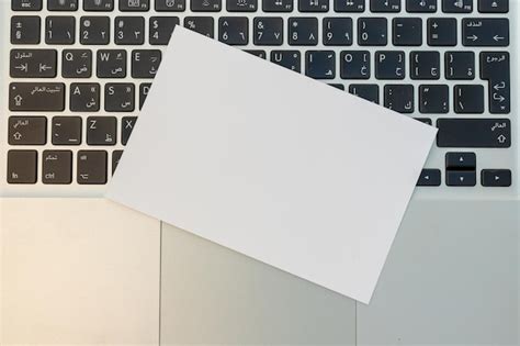 Premium Photo White Blank Card With Space For Text Laying Over A Keyboard