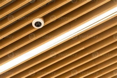 Dome Cctv Install On Ceiling With Light Wooden Design Security Cctv Camera Is Mounted On The