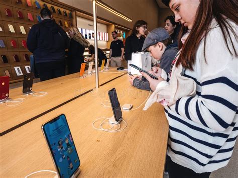 Woman Testing Apple Computers Iphone Xs In Apple Store Editorial Stock