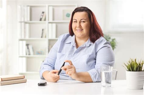 Young Woman Sitting And Using A Finger Insulin Pen Stock Image Image Of Measuring Measure