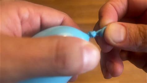 How To Tie A Balloon Quick And Easy Balloon Knot Tutorial Youtube