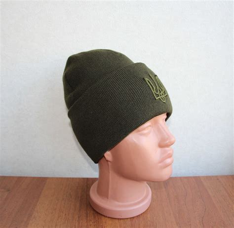 Шапка зимова вязка с гербом 225 грн Шапки Одеса на Olx