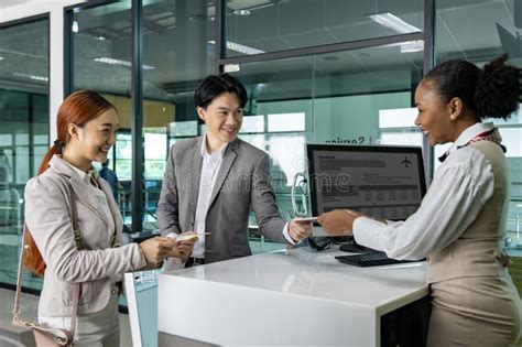 Caucasian Passenger Is Showing Her Online Check In Qr Code Boarding Pass To The Airline Ground
