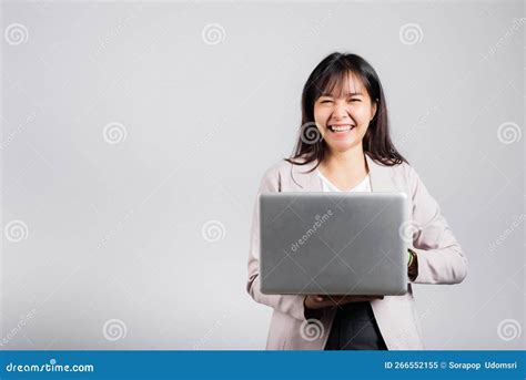 Woman Smiling Confident Smiling Holding Using Laptop Computer And