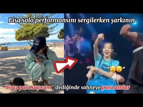 Lisa solo performansını sergilerken şarkının biraz para saçıcam