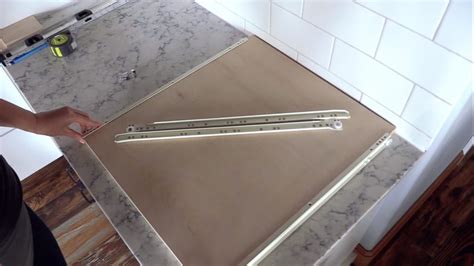 Crafty Woman Easily Converts Her Cabinet Shelves Into Roll Outs For Just