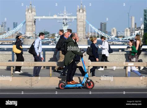 A Man Riding On A Dott E Scooter Part Of The Transport For London E Scooter Hire Scheme London