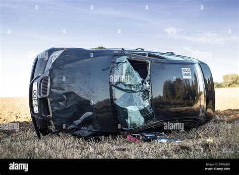 Car On Its Rolled Onto Its Side In A Field After Going To Fast Around