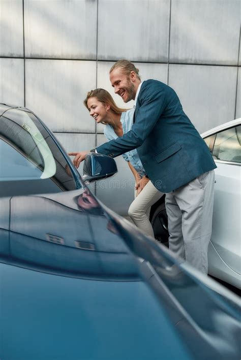 Couple Peeping Through Hole In Paper Stock Image Image Of Discover