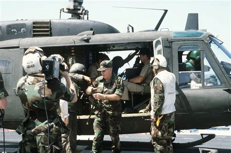A Trooper From A Sqn 22 Sas Aboard A Huey During 58 Off