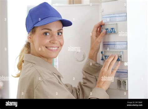 Woman Measuring Electrical Current Stock Photo Alamy
