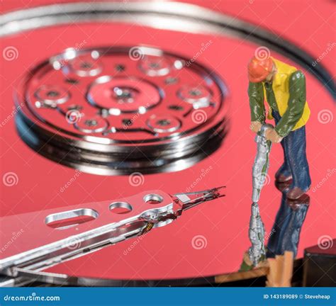 concept illustration of artificial intelligence or data mining using hard drive stock image
