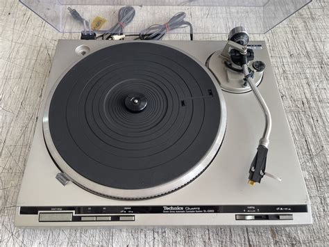 เครื่องเล่นแผ่นเสียง Technics Sl Q303 ระบบ Direct Drive ใช้ไฟ 100 V ต้องมีหม้อแปลง พร้อมเฮดเชล
