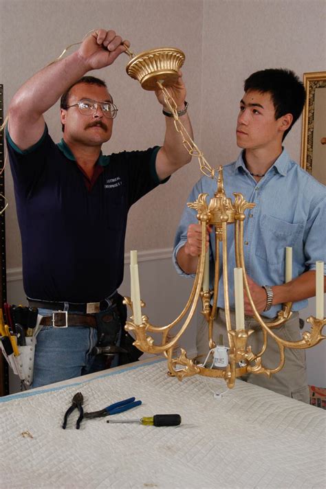 How To Install A Chandelier The Money Pit How To Install A Chandelier The Money Pit