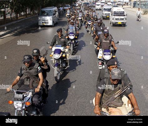 Rangers And Sindh Police Staffs Are Jointly Holding A Flag March To