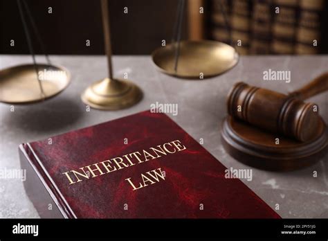 Inheritance Law And Gavel On Grey Marble Table Closeup Stock Photo Alamy