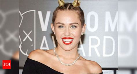 Miley Cyrus Posts New Topless Pictures Online English Movie News Times Of India