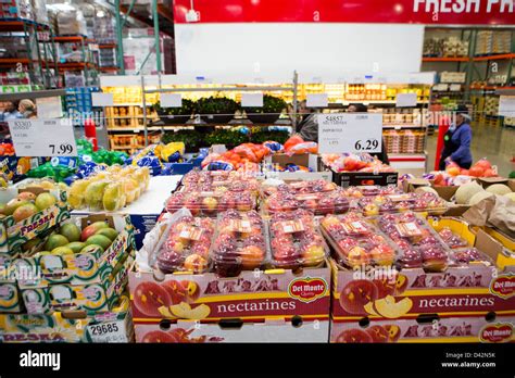 Customers Shopping In The Produce Section Of A Costco Wholesale