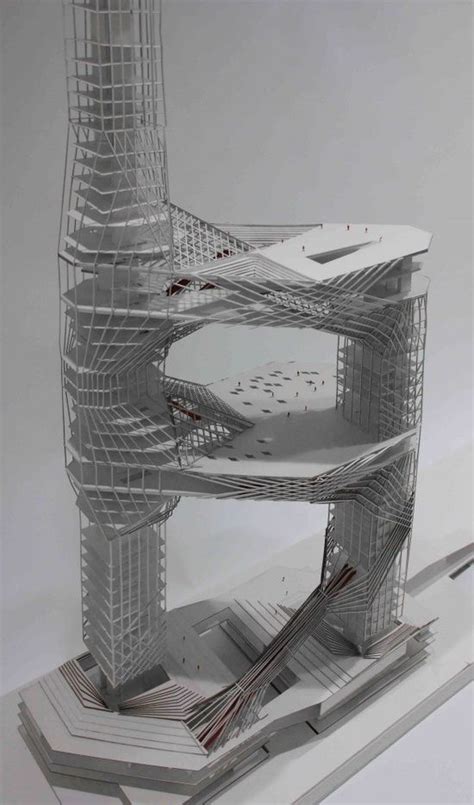 An Image Of A Very Tall Building Made Out Of Wire And Cardboards On Top