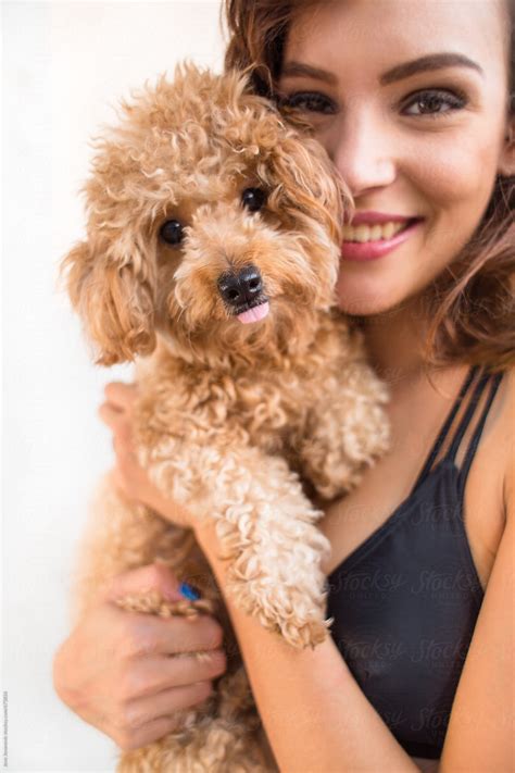 Beautiful Brunette Woman Girl With Cute Dog Looking At Camera By