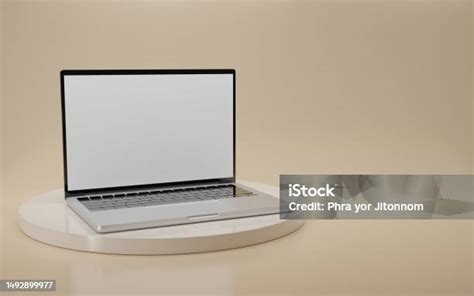 3d 렌더링 베이지색 배경에 스탠드에 있는 컴퓨터 랩탑 흰색 화면을 조롱합니다 3d 렌더링 0명에 대한 스톡 사진 및 기타 이미지 Istock