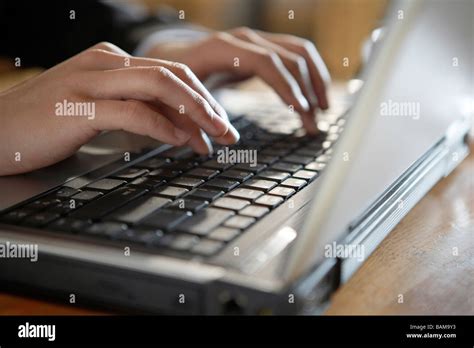 Man Typing On Laptop Computer Stock Photo Alamy