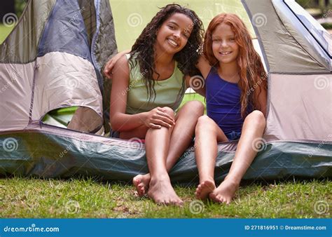 The Girls Tent A Two Young Girls Sharing A Tent While Camping Stock