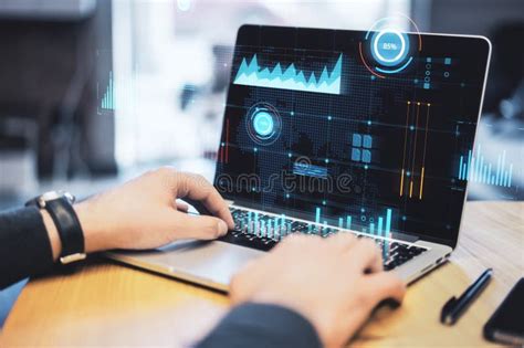 Close Up Of Male Hand Using Laptop Computer Keyboard With Glowing Digital Business Interface