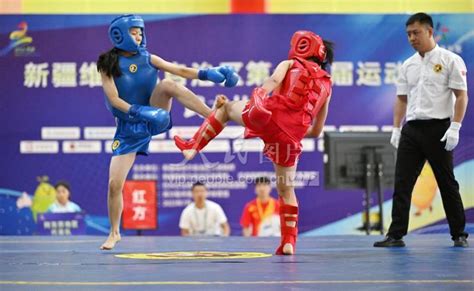 新疆维吾尔自治区第十四届全运会武术散打项目比赛开赛 人民图片网