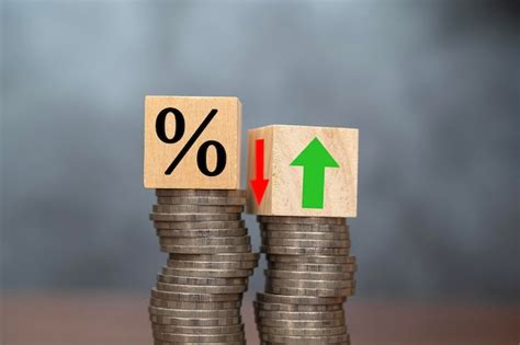 Premium Photo The Concept Of Increasing Or Decreasing Interest Rates Wooden Cube With