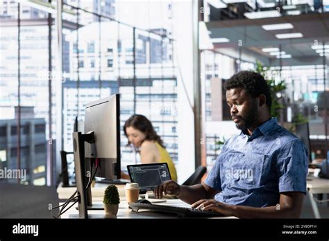 System Administrator Conducting Detailed Code Review To Fix Bugs Identifying Potential