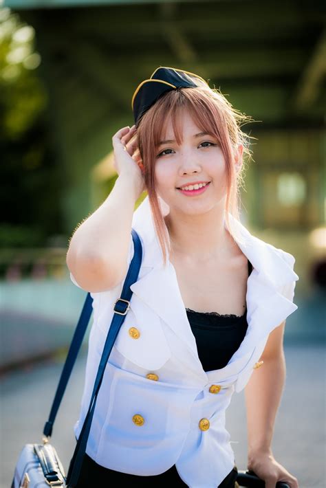 878645 Asian Pose Legs Suitcase Uniform Glance Stewardesses