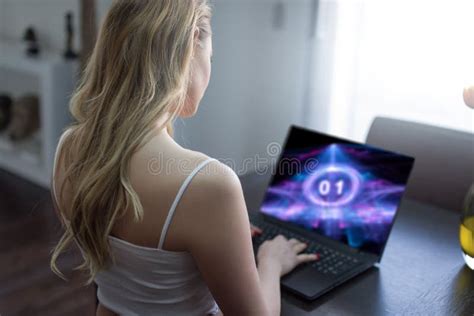 Blonde Woman Programmer Coding On Laptop At Home Concept Stock Image