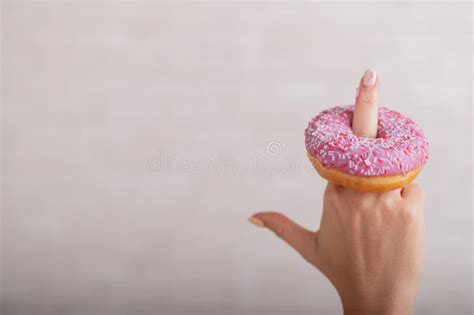 Donut On The Female Middle Finger Sex Gesture Stock Image Image Of Bakery Gluttony