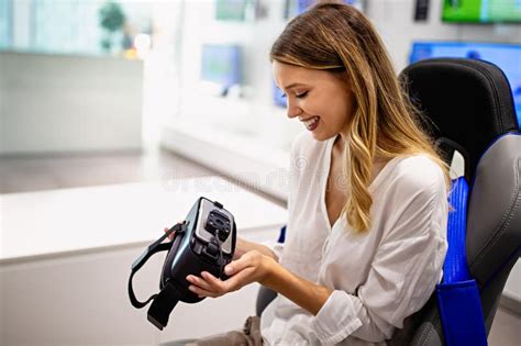 Portrait Of Woman Using Virtual Reality Headset At Exhibition Show Vr Technology Simulation