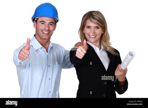 Male And Female Architect Thumbs Up Stock Photo Alamy
