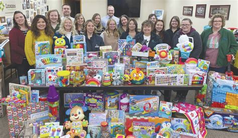 Leugers Insurance Makes Holiday Donation Sidney Daily News