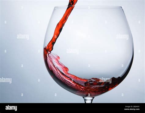 Wine Being Pouring Into A Glass Closeup Wine Splashing Splash Stock